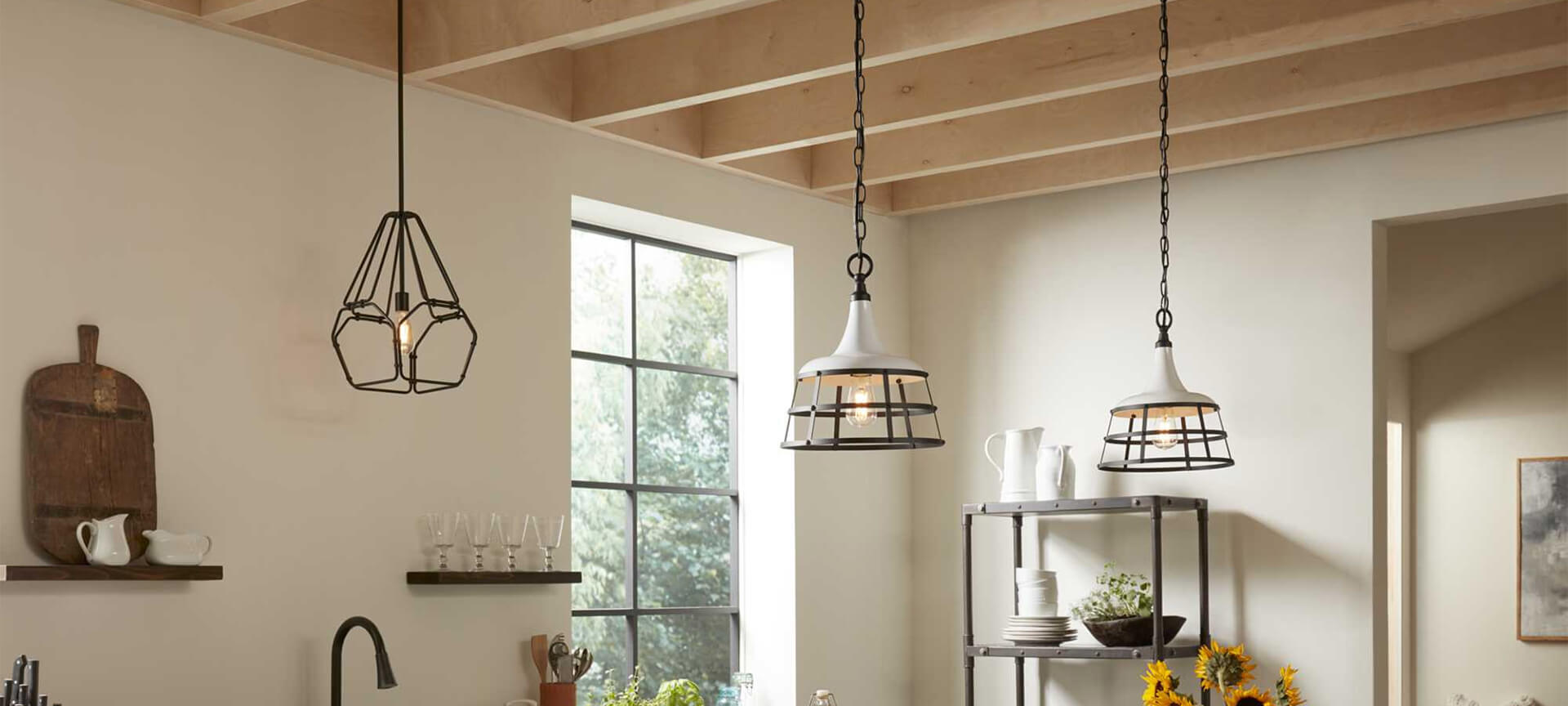 Custom kitchen lighting design with pendant fixtures at Christie’s ...